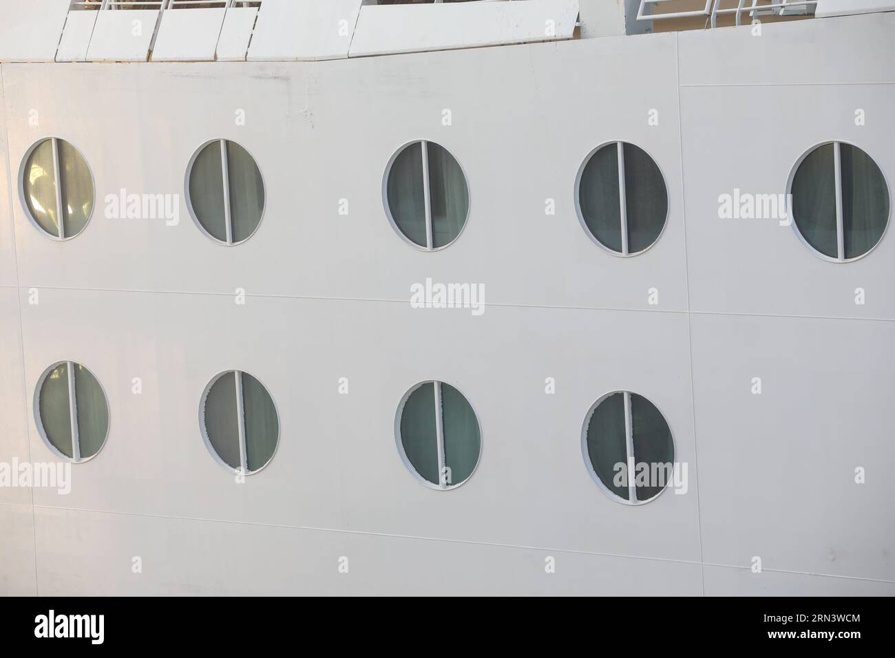Ship porthole, small windows on ship side Stock Photo - Alamy