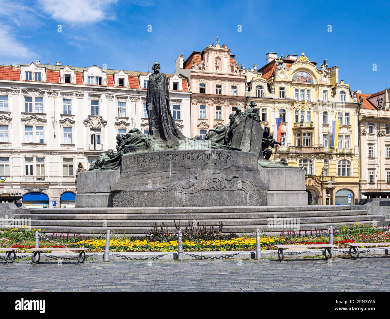 On the bronze sculpture dedicated to the martyr Jan Hus, he is depicted ...