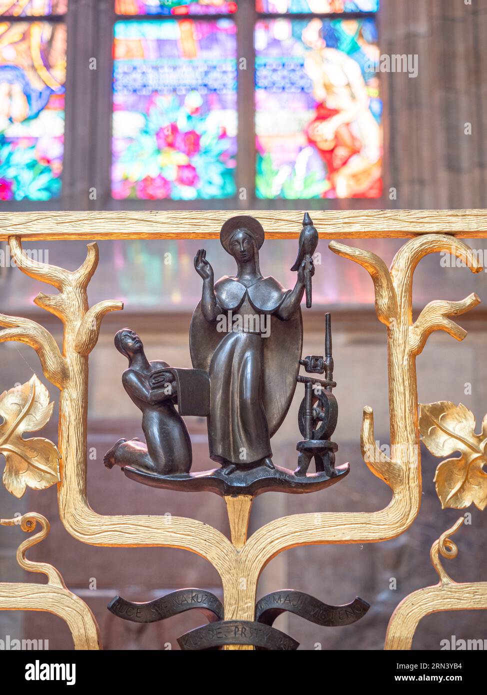Detail of a sculpture of St Ludmila on the gate to her Chapel inside St ...