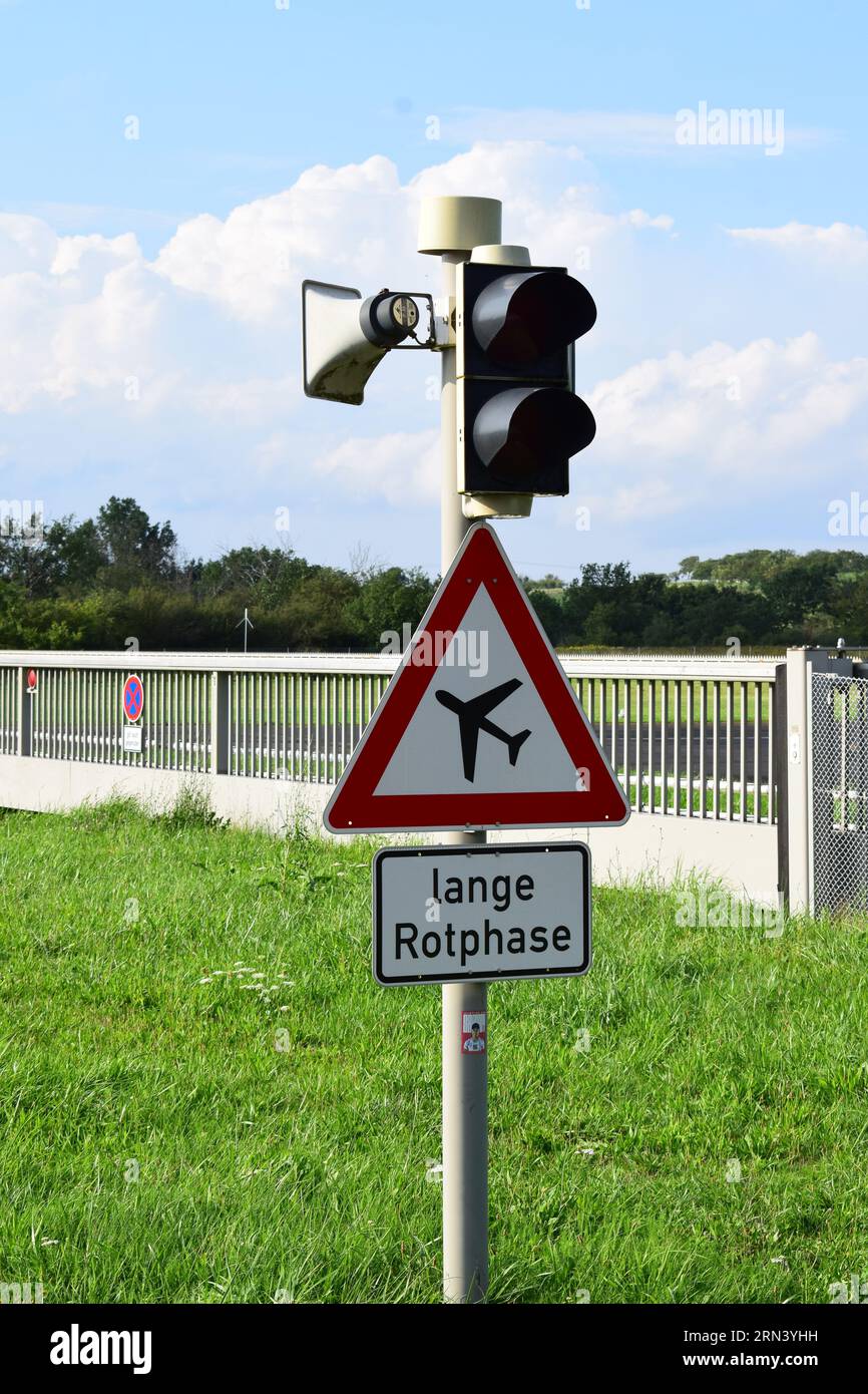 plane warning sign at the road next to airfield Winnigen near Koblenz ...