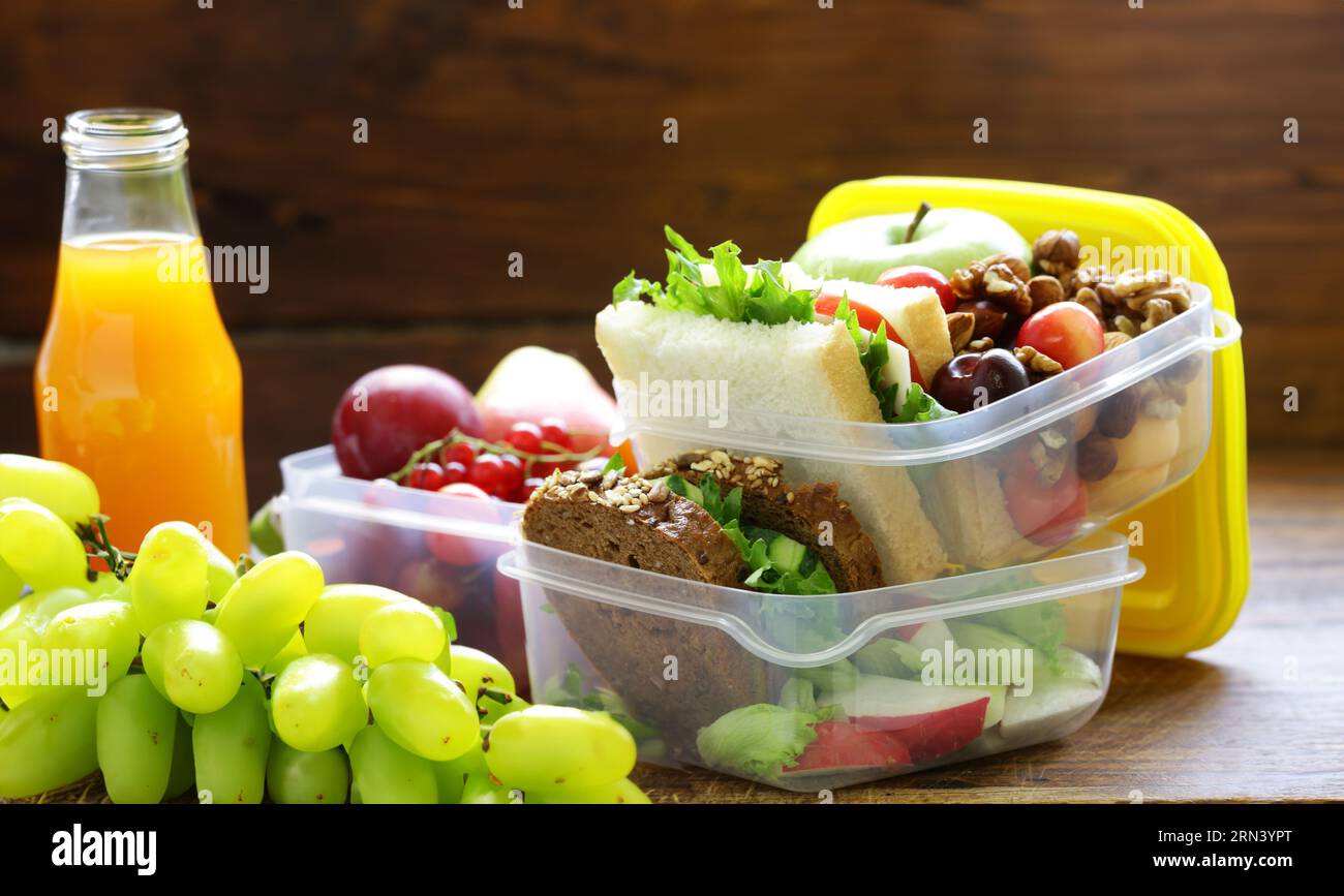 healthy food lunch box with fruits and salad Stock Photo - Alamy