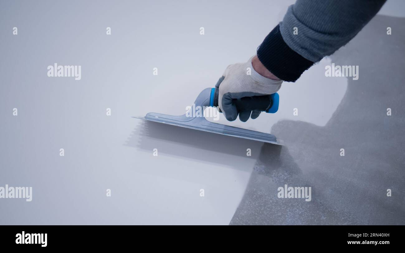 Applying flooring hi-res stock photography and images - Alamy