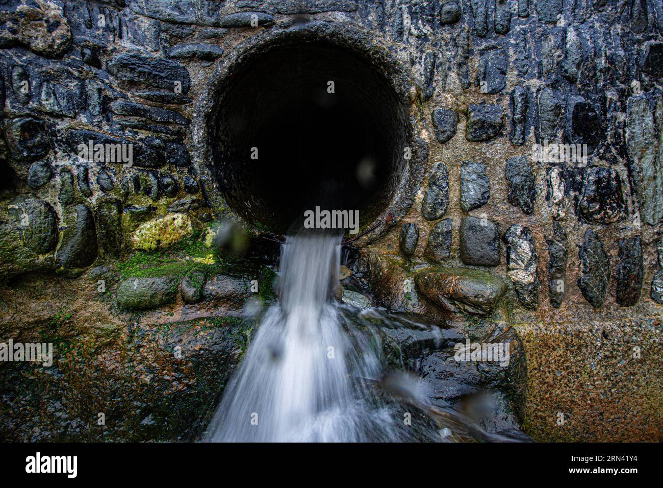South West Water work pipe spilling water onto the beach at Trevaunance ...