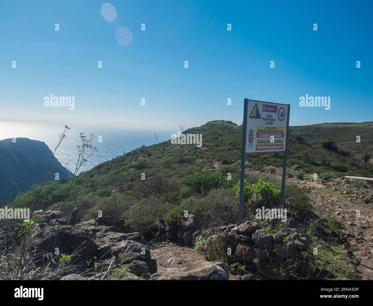 Notice board sign with information of closed hiking trail at the ...