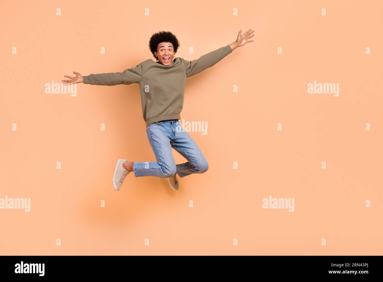 Full body photo cadre of young careless student guy fly wings jump ...