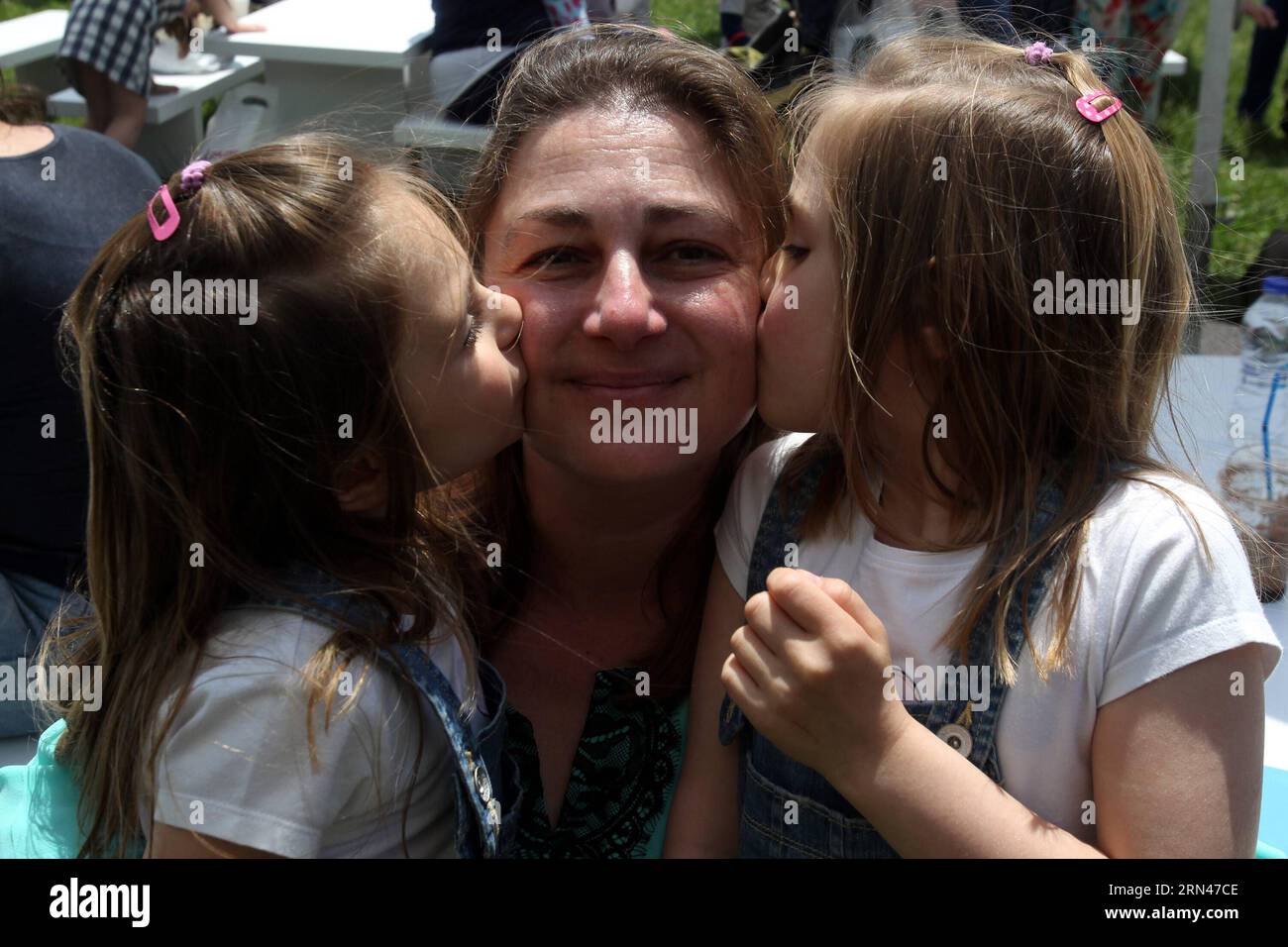 Two girls kiss hi-res stock photography and images - Alamy