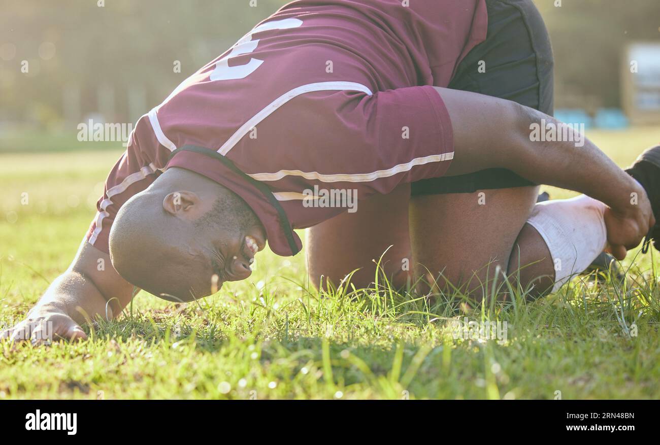 Football on ground injury injured hi-res stock photography and images ...