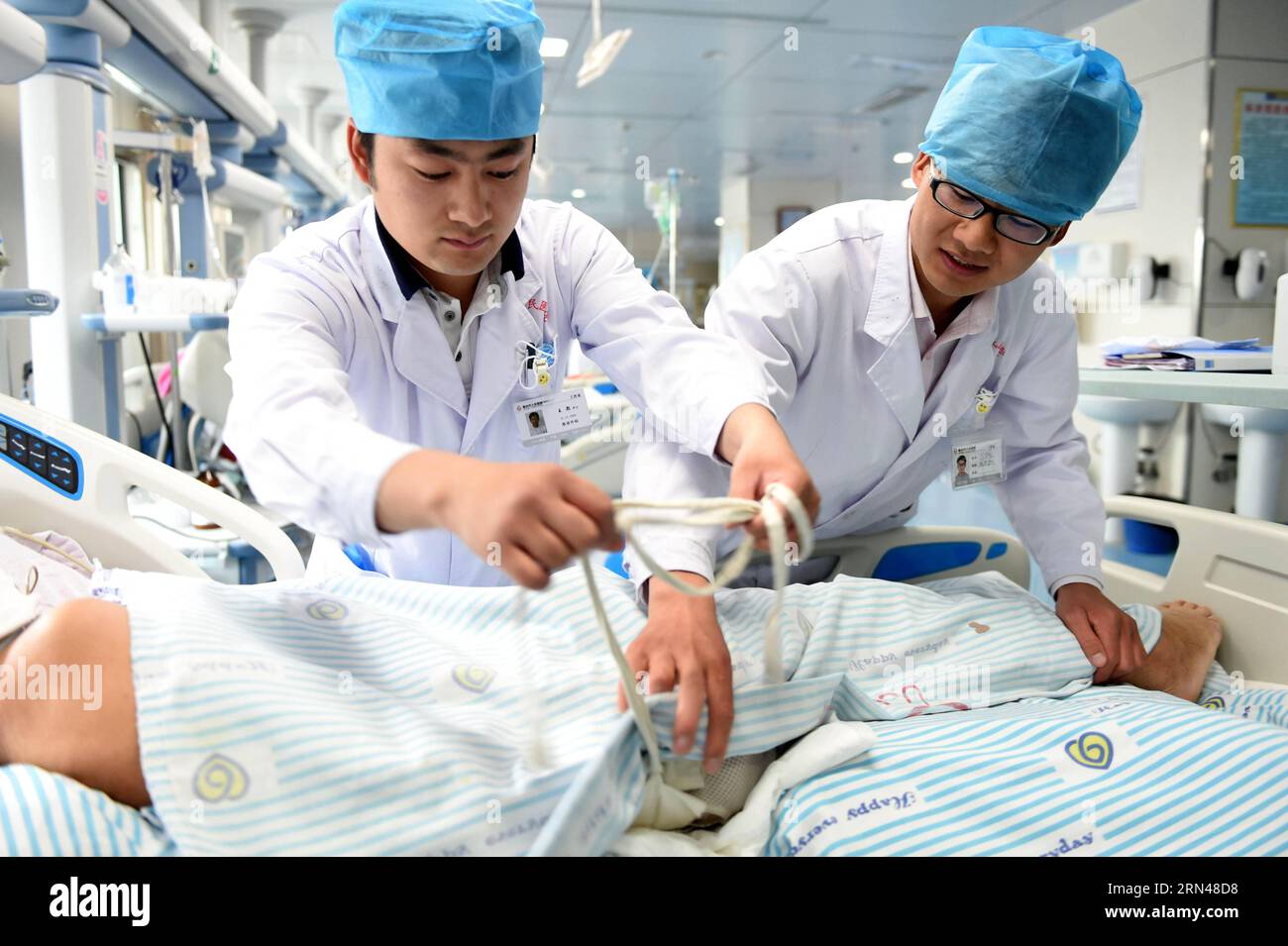 Male nurses work at the ICU in People s Hospital in Bozhou, east China ...