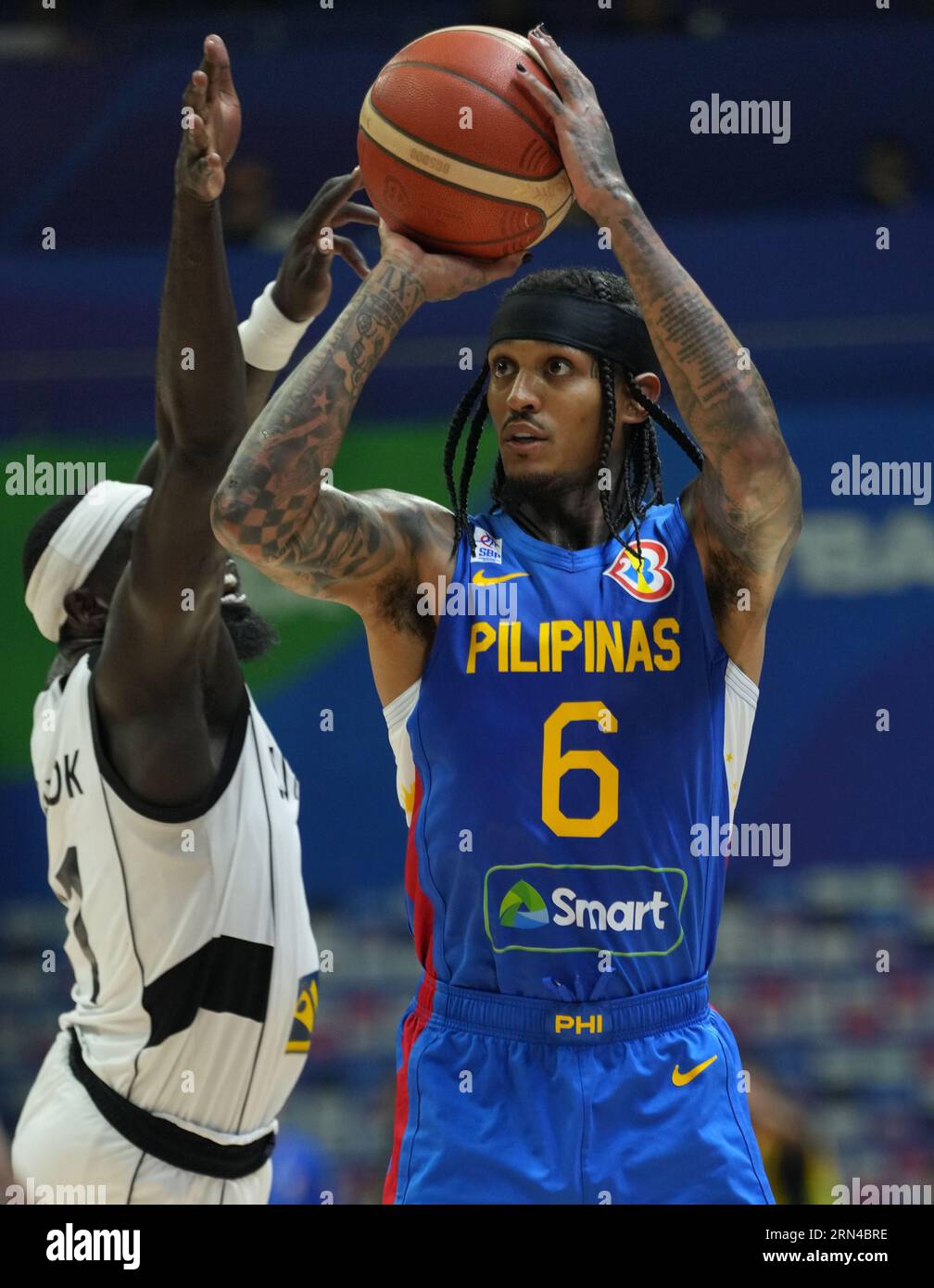 Manila, Philippines. 31st Aug, 2023. Jordan Clarkson (R) of the ...