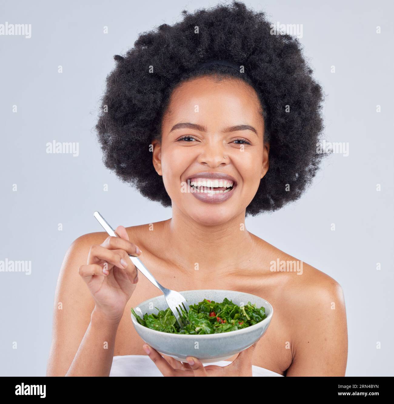 Health, portrait and black woman with a salad in studio for diet dinner ...
