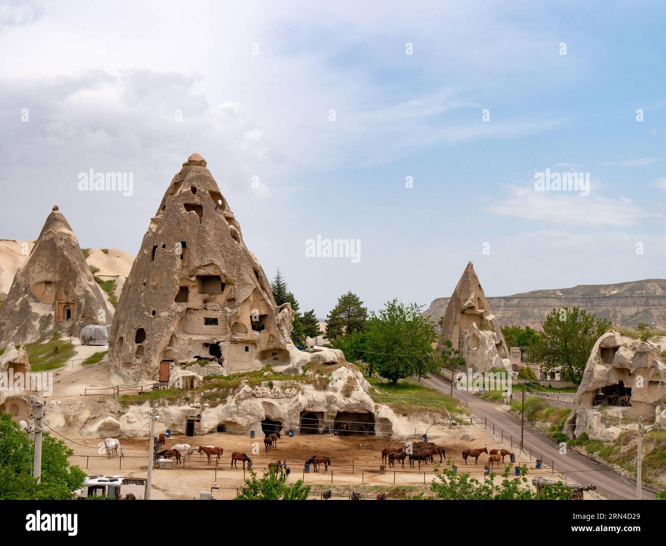 Caves in Pointy Rock Formations in a rural area in Cappadocia, Central ...