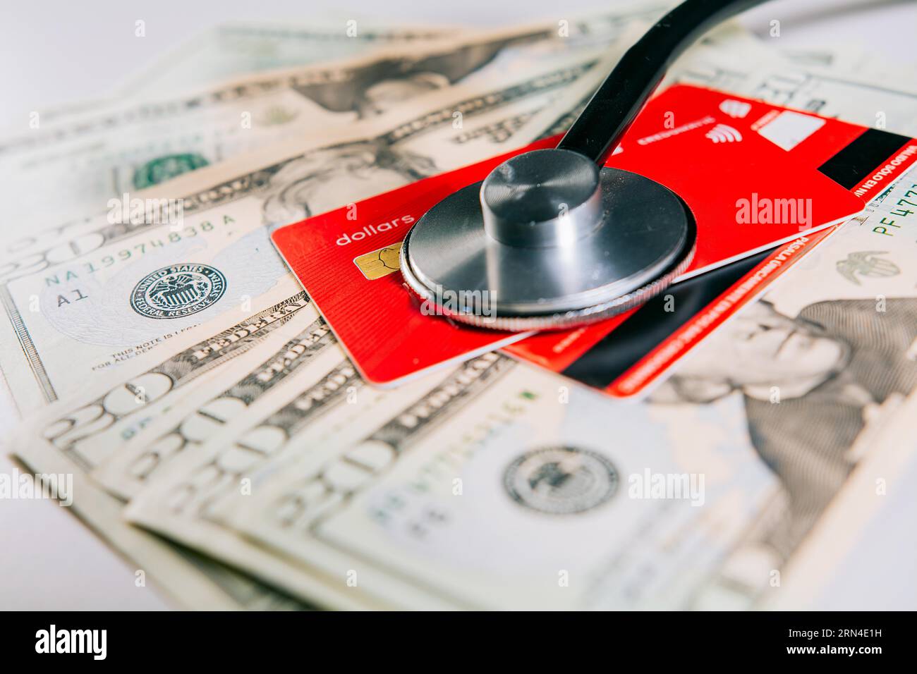 Concept of online medical payments with credit card. Stethoscope with ...