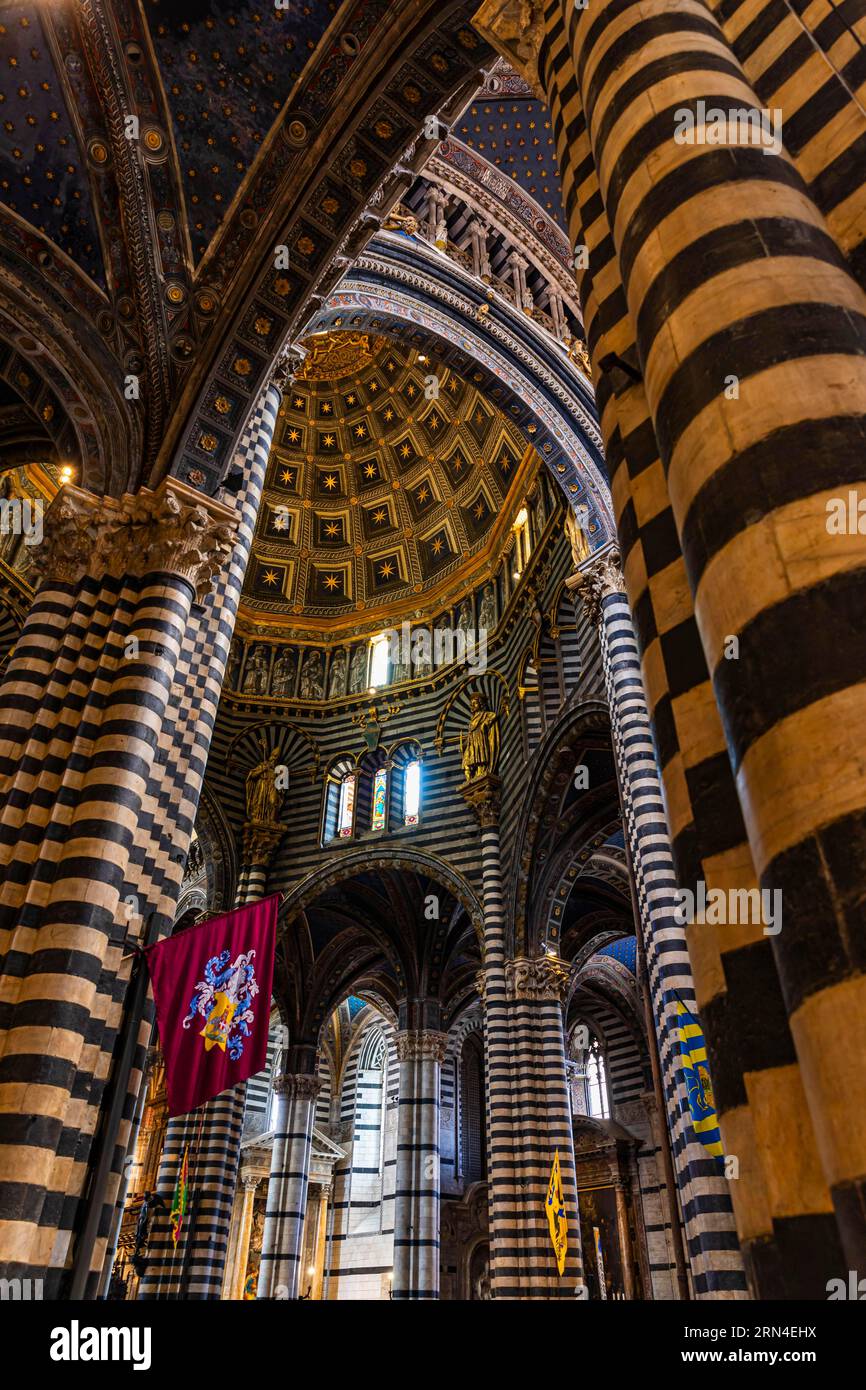 Black and white striped marble columns in the cathedral below the dome ...