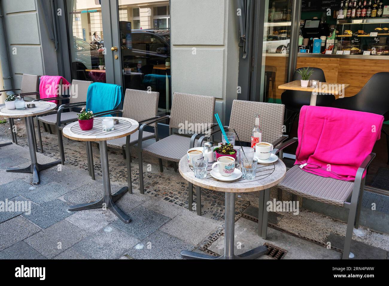 Bistro tables with colourful blankets, Maxvorstadt, Munich, Upper ...
