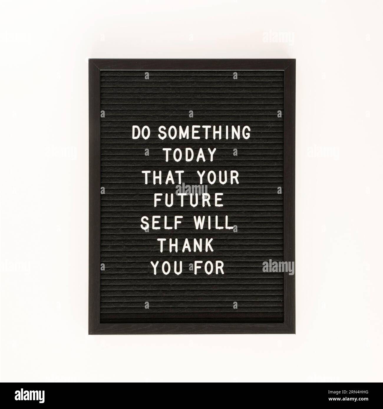Black motivational text board top view Stock Photo - Alamy