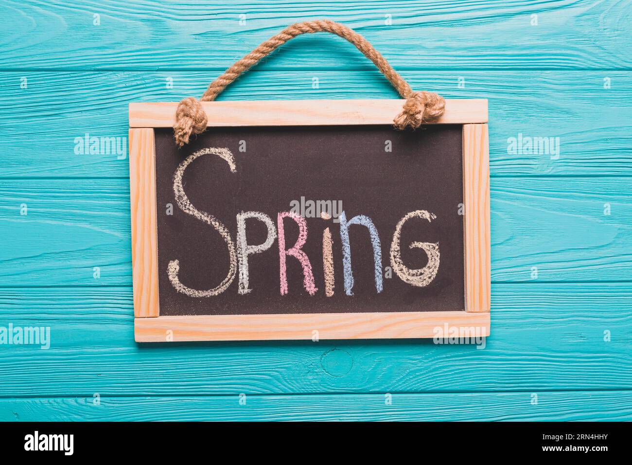 Blackboard with spring writing Stock Photo - Alamy