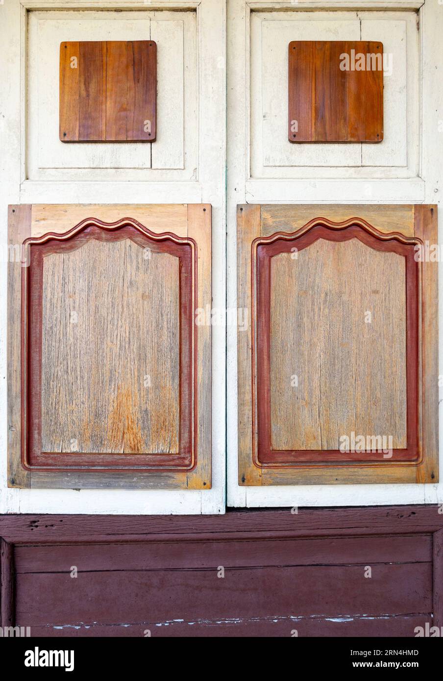 The closed wooden window of the ticket booth of an old train station ...