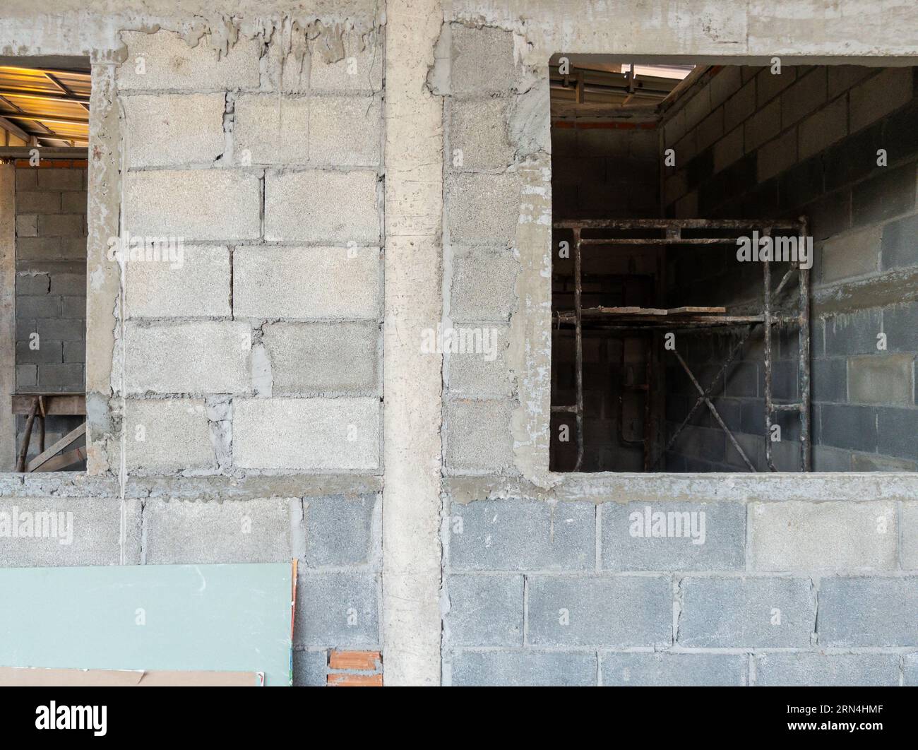 The block wall is under construction and unplastered of the rural house ...