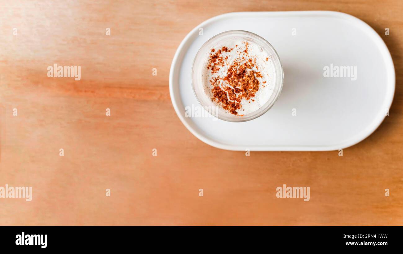 Cocoa powder coffee glass tray brown textured backdrop Stock Photo - Alamy