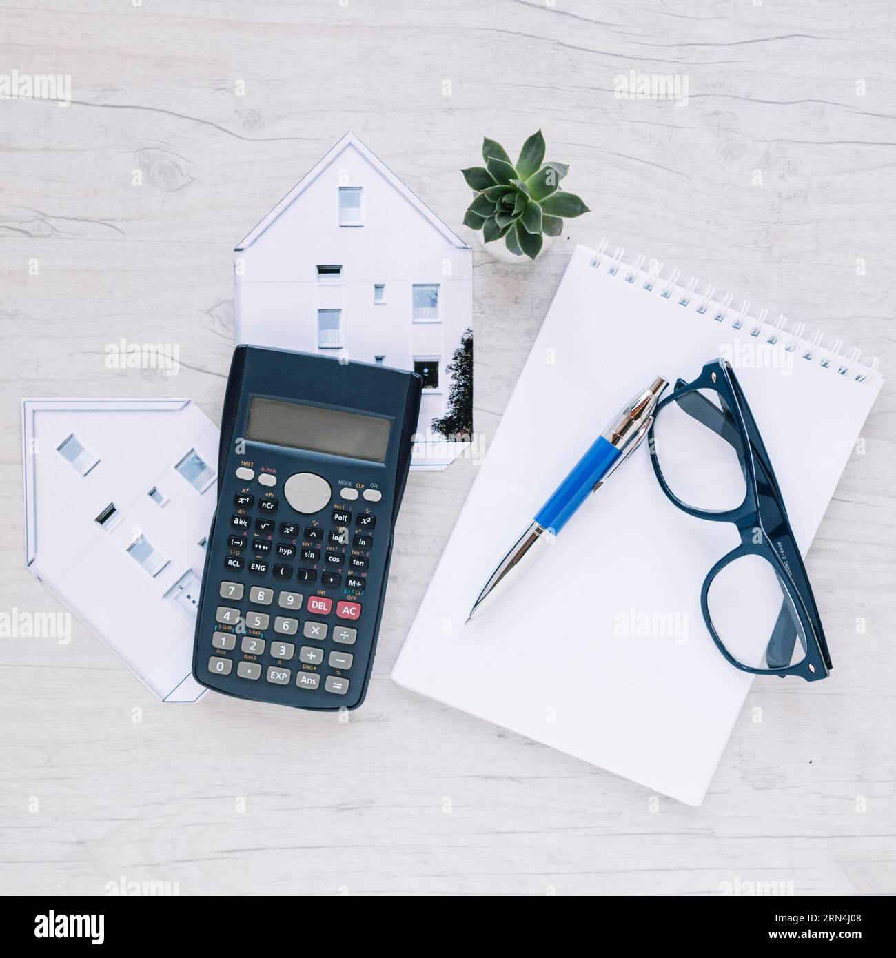 Composed notepad realtor desk Stock Photo - Alamy