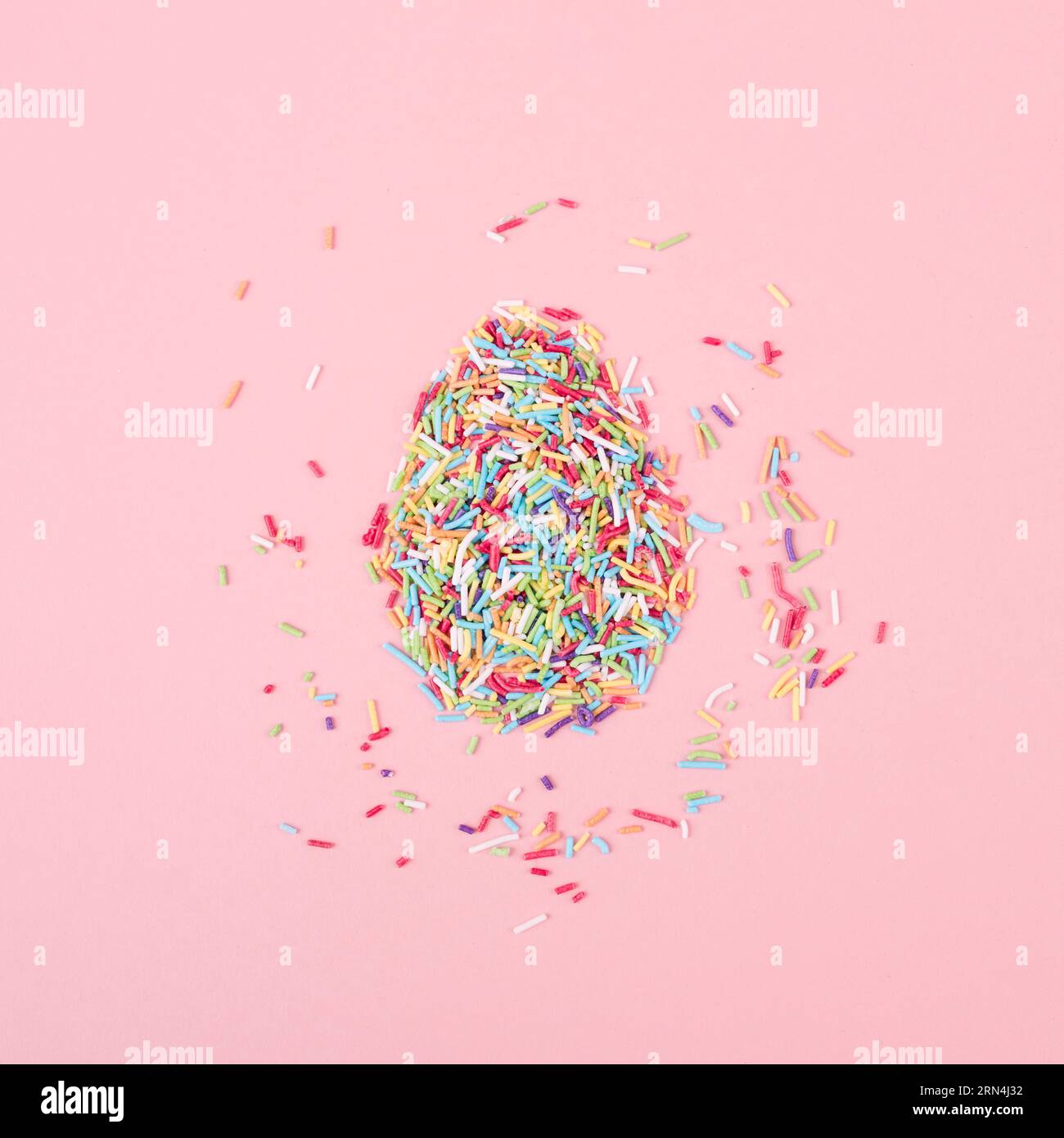 Egg made colorful sprinkles table Stock Photo - Alamy