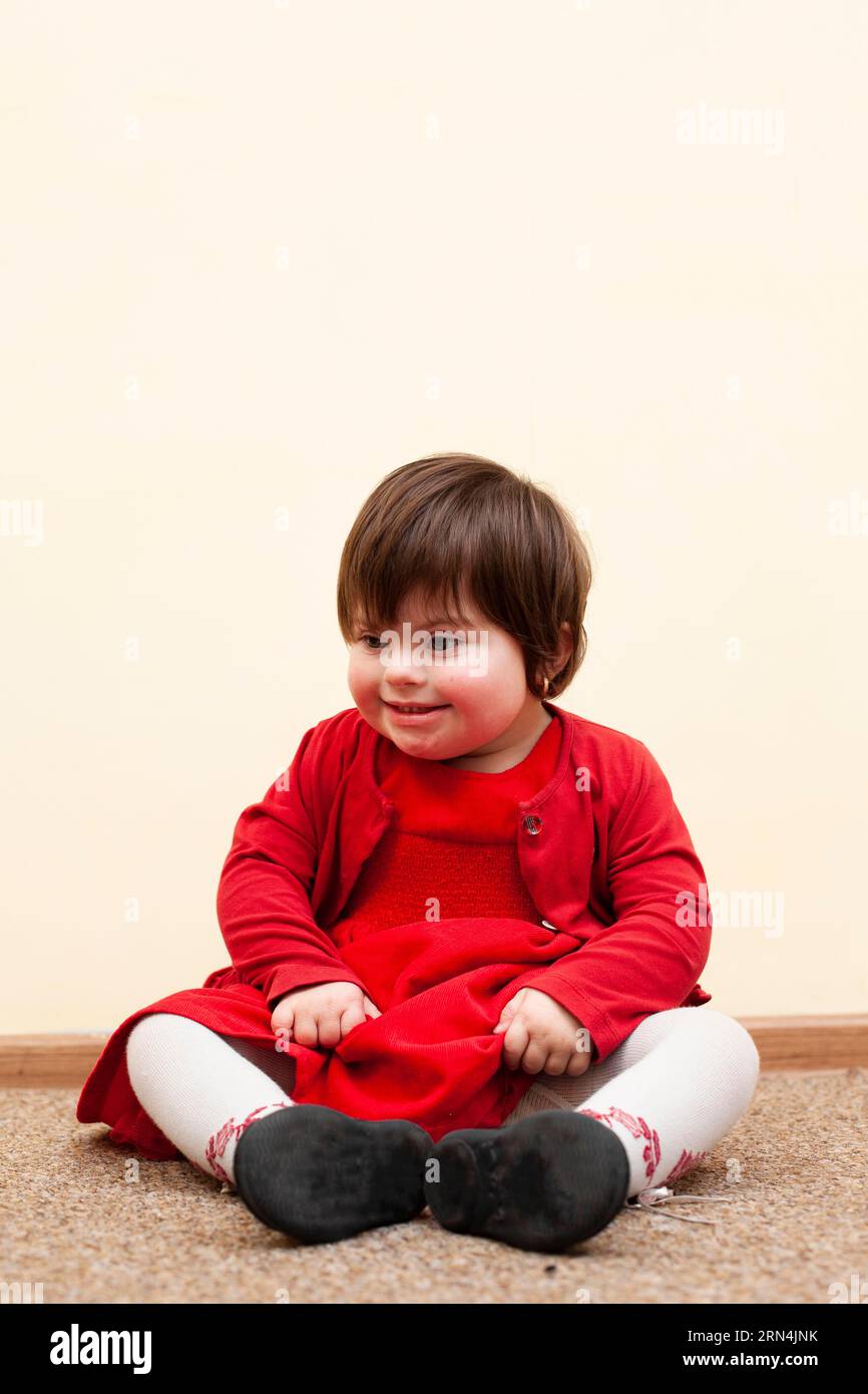 Happy child with down syndrome Stock Photo - Alamy