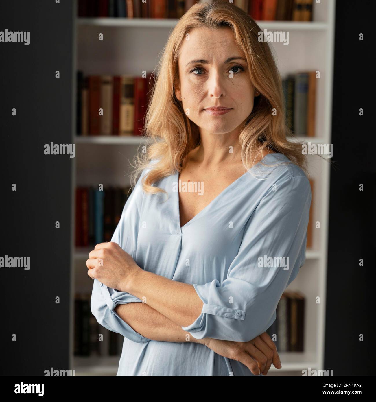 Mid shot woman counselor office Stock Photo - Alamy