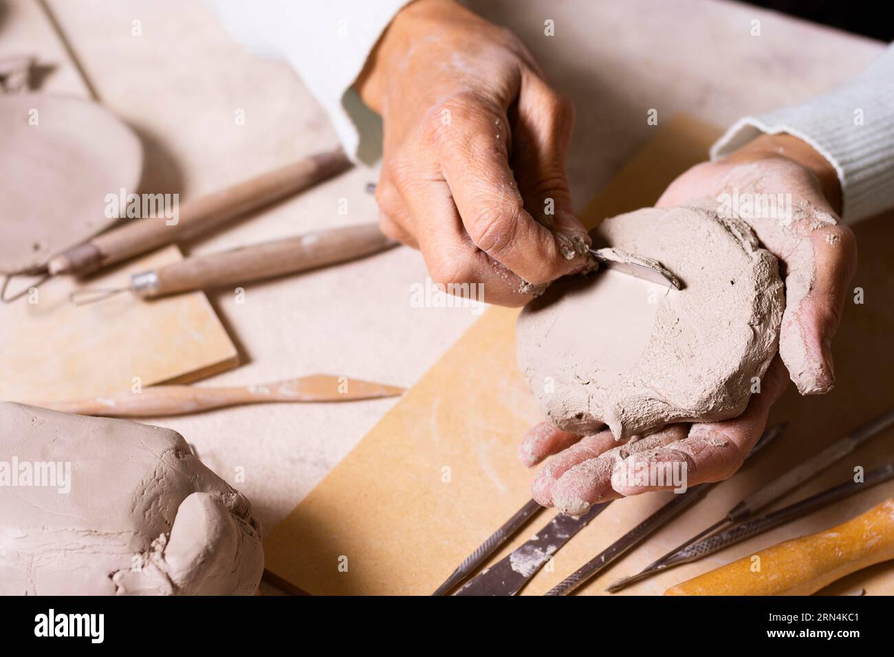 Modeling clay pottery Stock Photo - Alamy