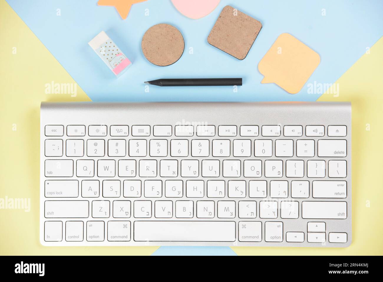 Shapes eraser pencil near white keyboard dual backdrop Stock Photo - Alamy