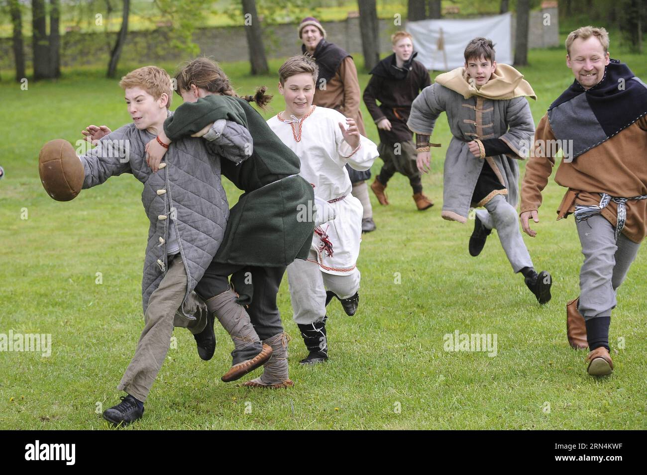 (150524) -- KUKRUSE, -- Kids play a Viking s version of rugby using the ...