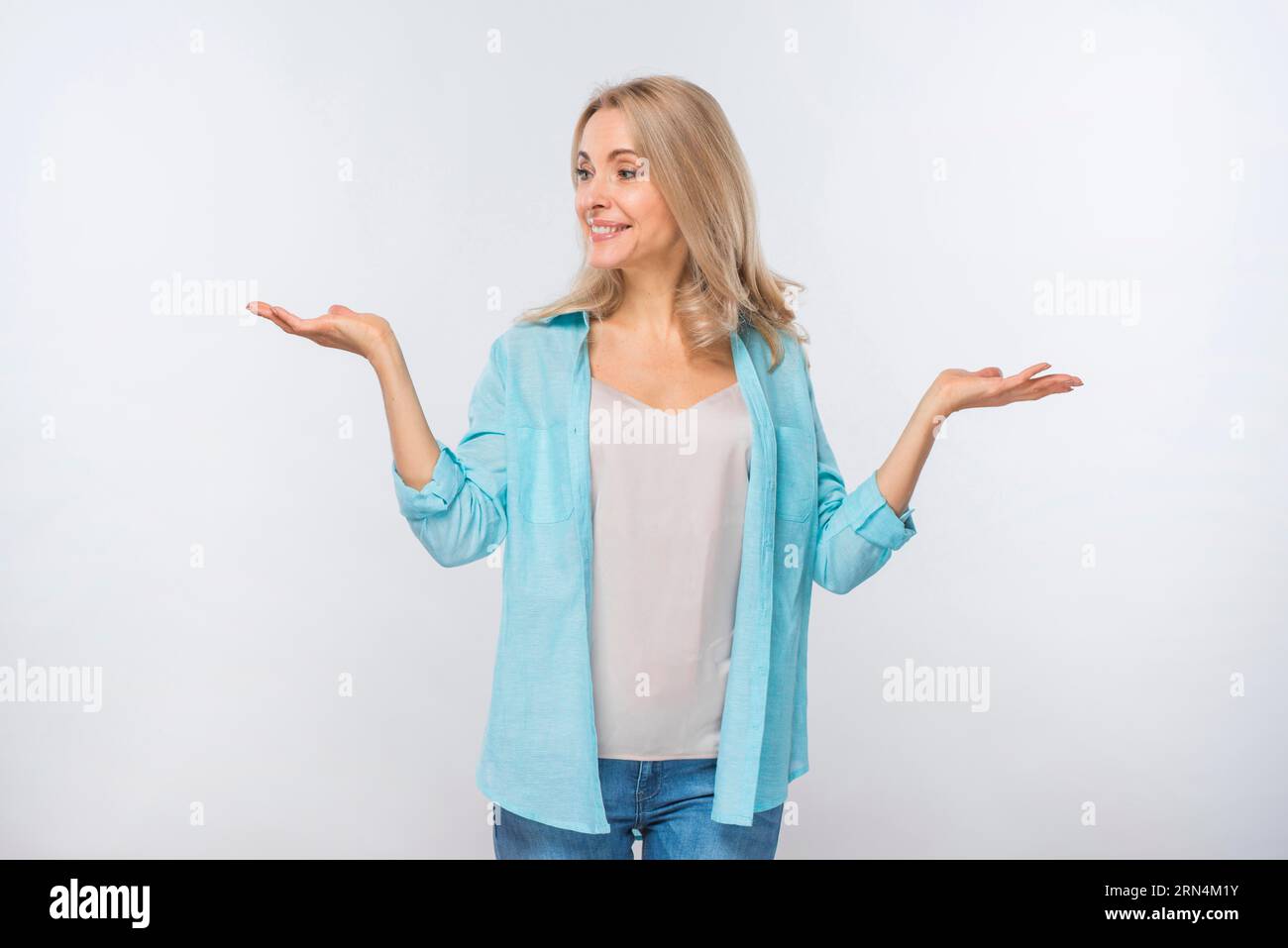 Woman shrugging isolated hi-res stock photography and images - Alamy