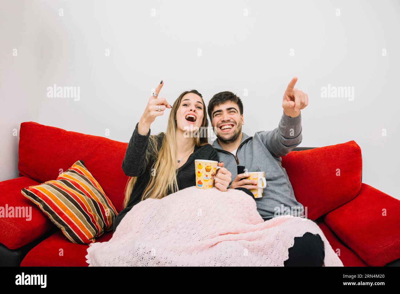 Smiling movie watching movie Stock Photo - Alamy