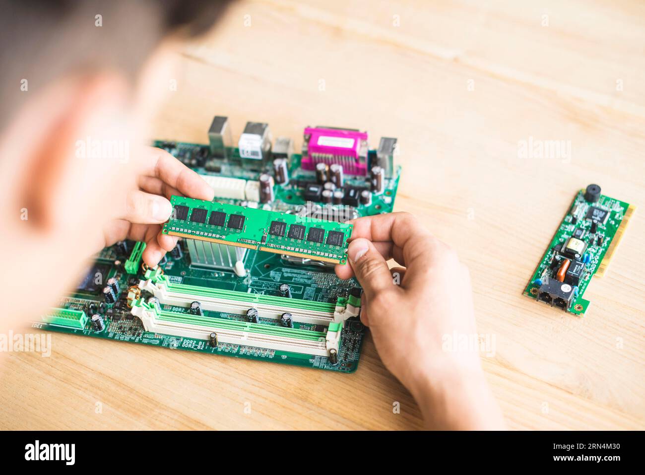 Technician testing ram computer motherboard table Stock Photo - Alamy
