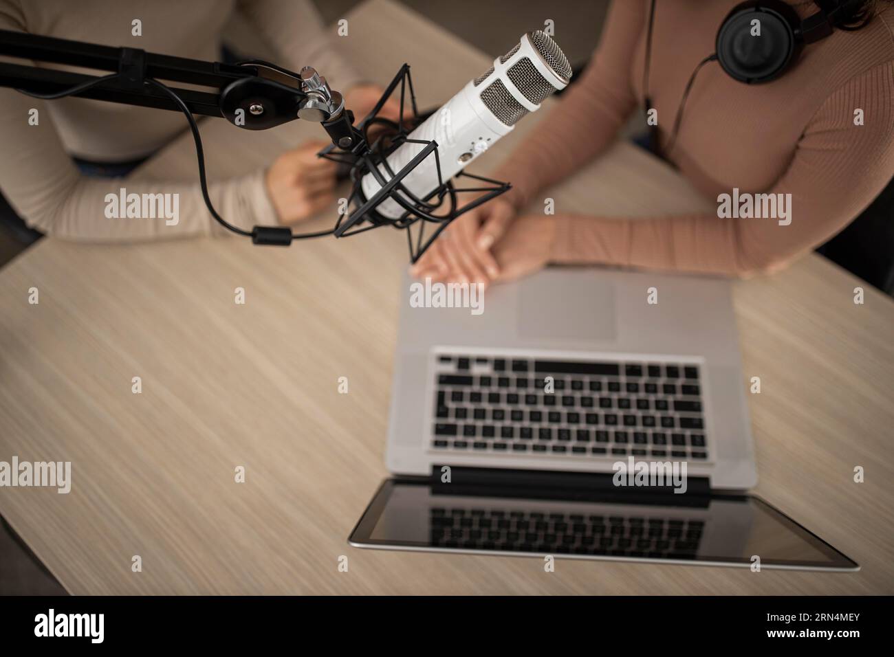 Top view women doing radio together Stock Photo - Alamy