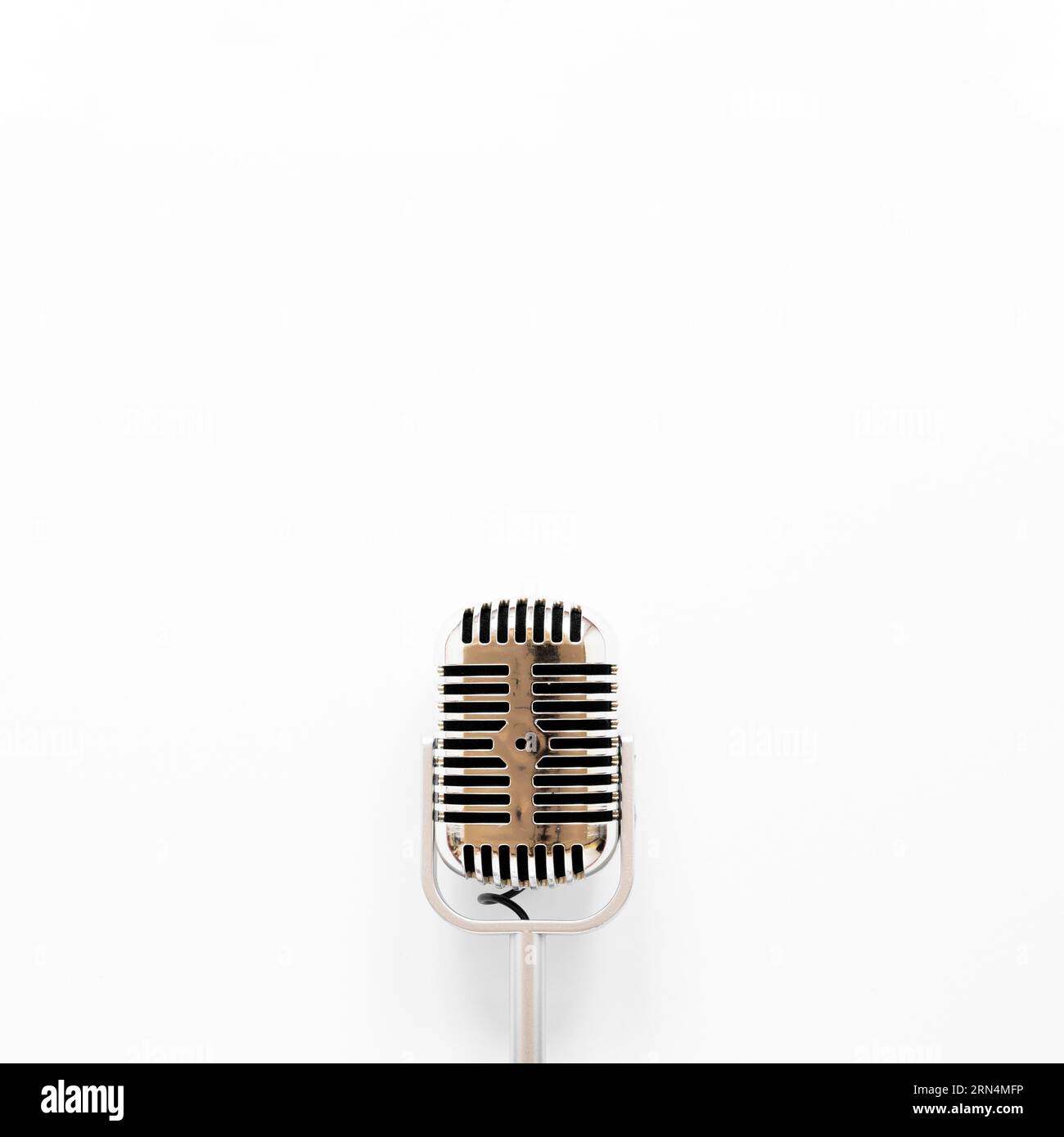 Top view microphone white background Stock Photo - Alamy