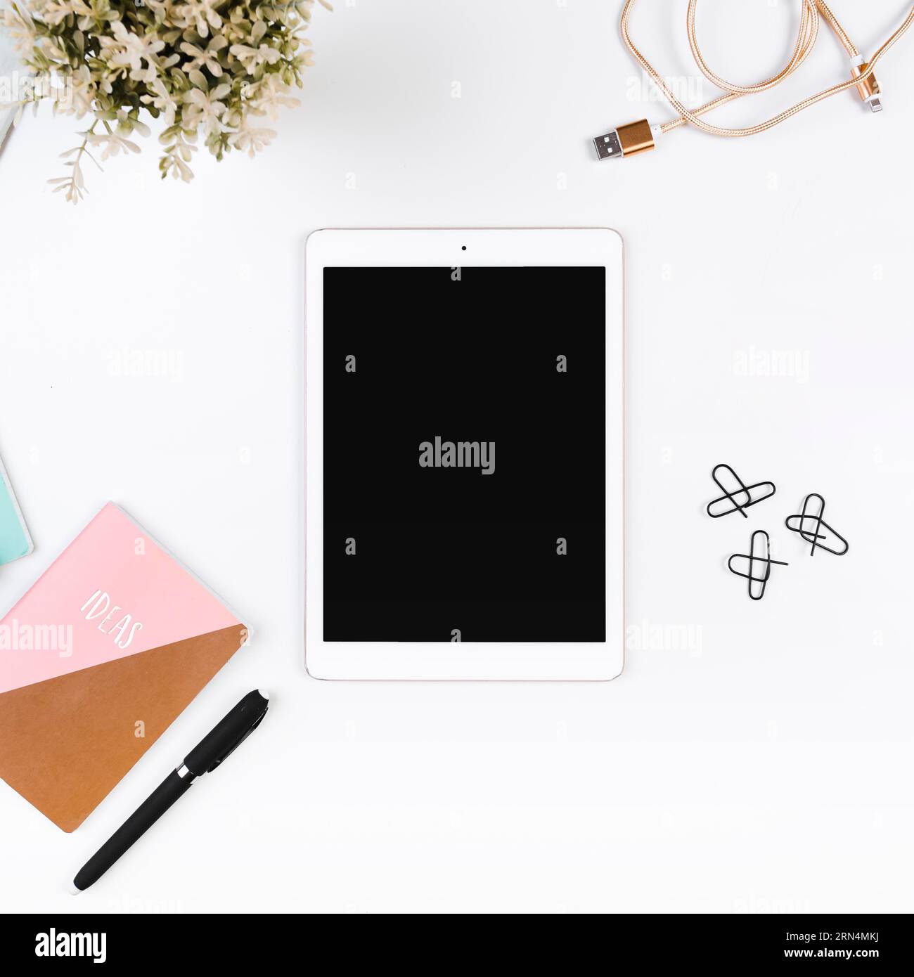 Workplace with tablet stationary Stock Photo - Alamy