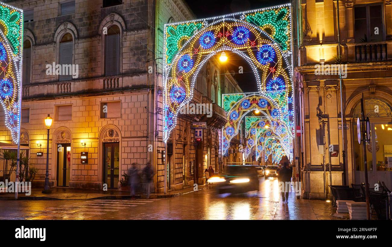 Night shot, illuminated historical buildings, festive street lighting ...