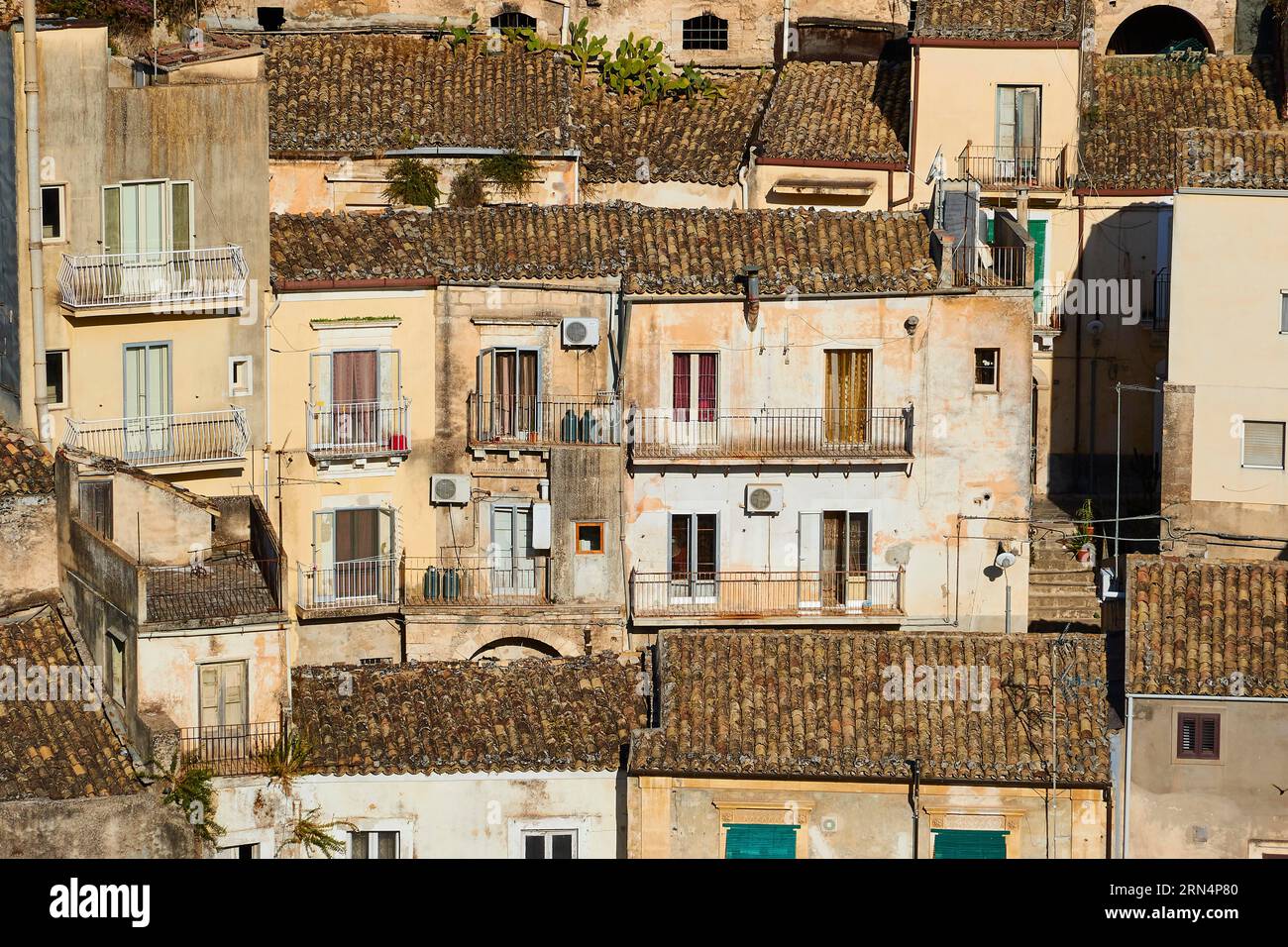 Buildings in the old town, close, red tiled roofs, Ragusa Ibla, baroque ...