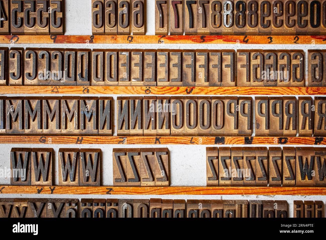 Set box with types, letters for embossing Stock Photo - Alamy