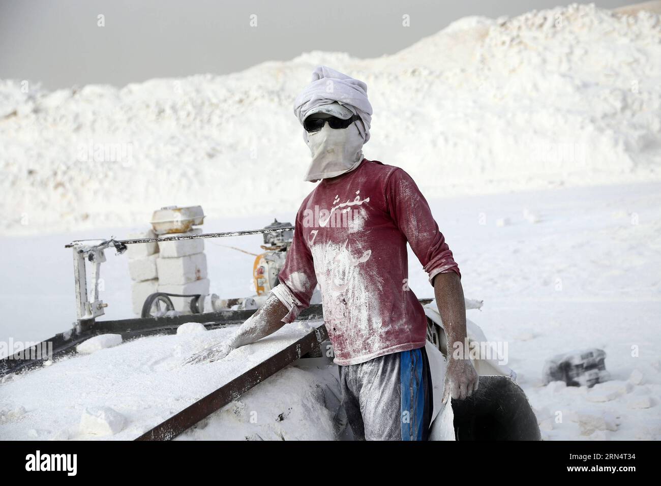 (150530) -- MINYA, - An Egyptian quarry worker poses on a limestone ...