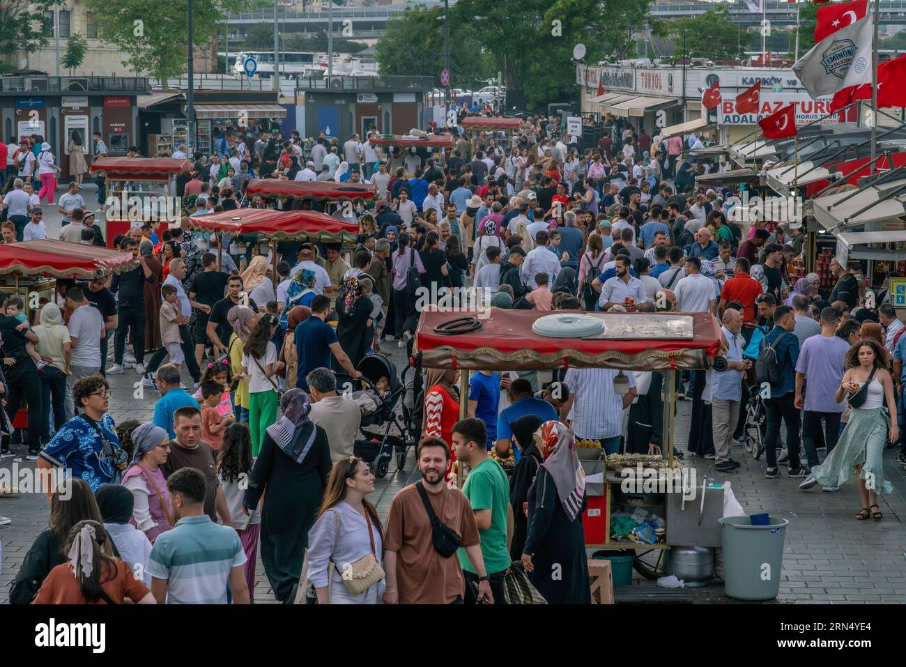 A crowd of people explore Eminonu Pier Kadikoy, Istanbul, Turkey ...