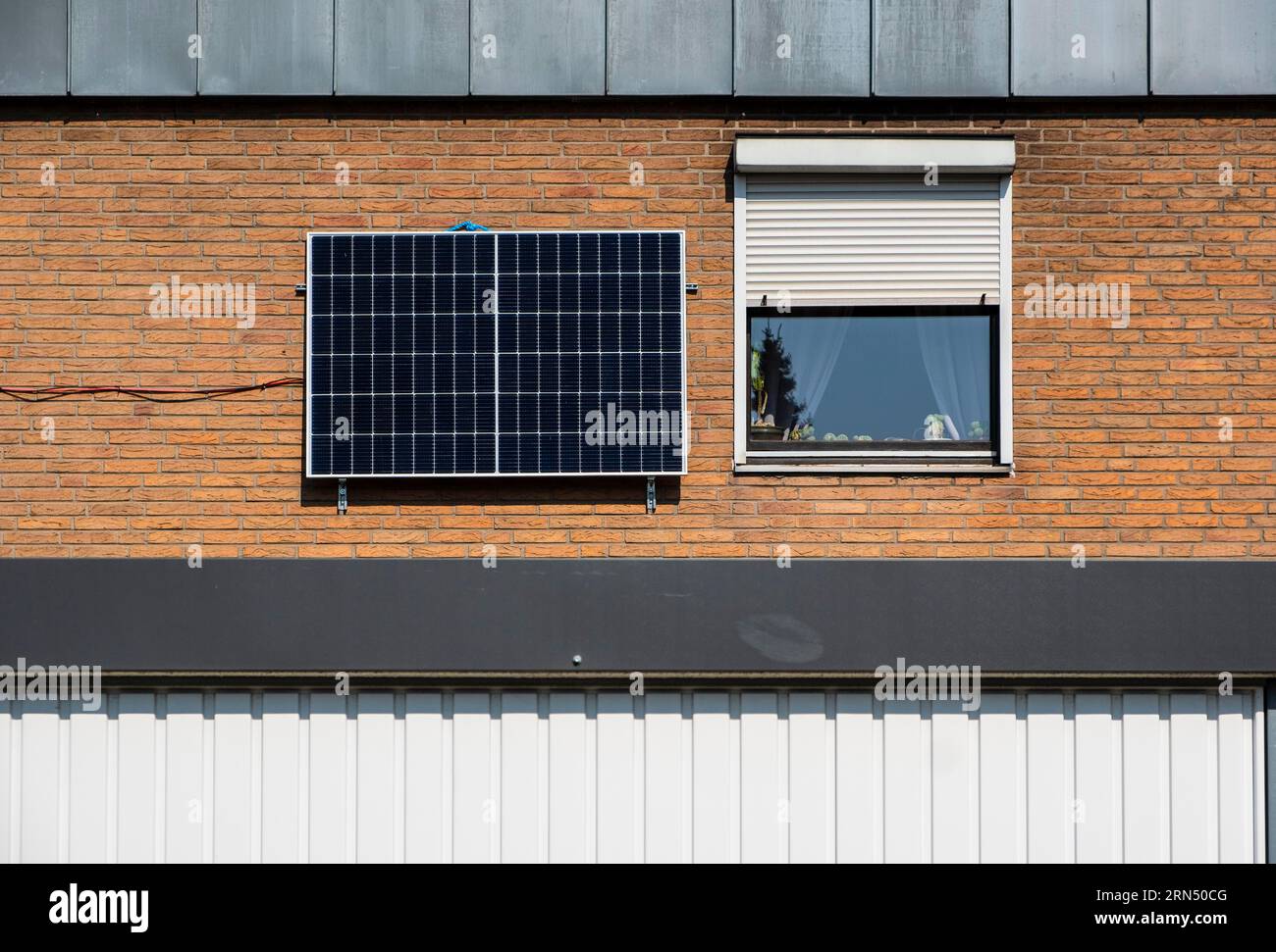 Balcony power plant Solar panel on a facade of a house in Duesseldorf ...