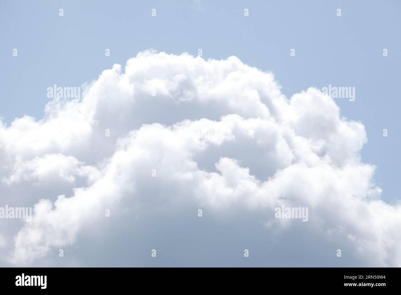 White spring clouds, blue sky, Germany Stock Photo - Alamy