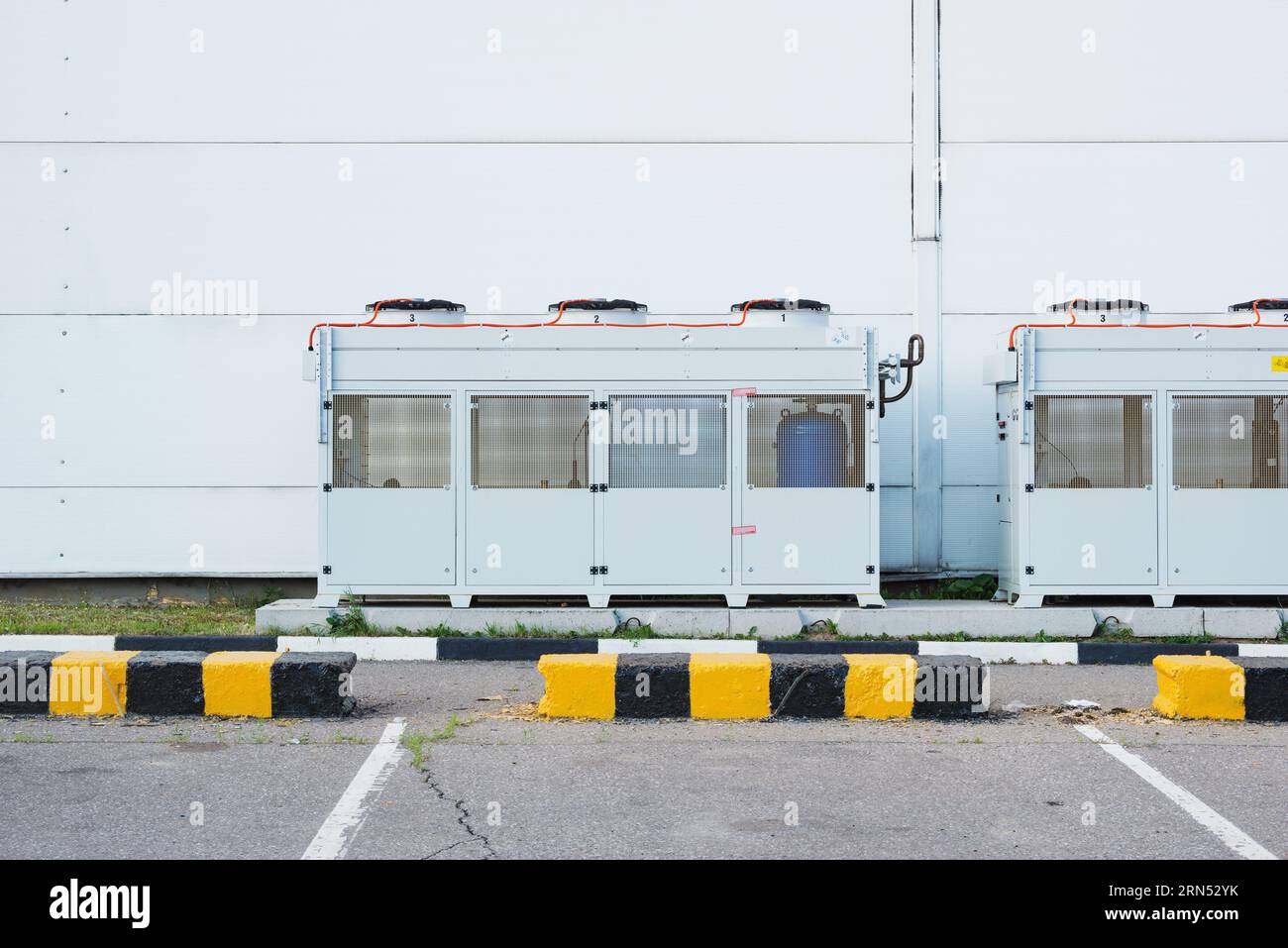 Air conditioning system by the warehouse building Stock Photo - Alamy