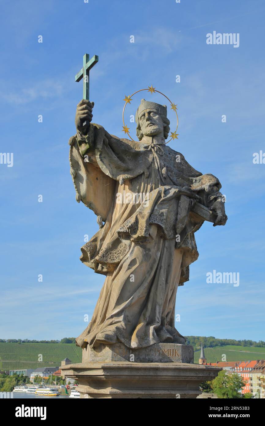 Statue of Saint John Nepomuk, sculpture, cross, halo, gesture, high ...