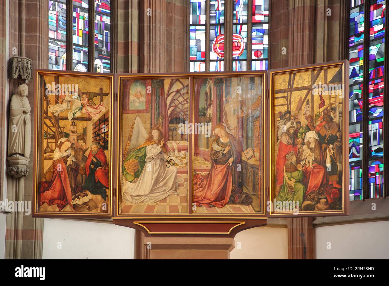Historic folding altar with painting of Madonna figure, angel and birth ...
