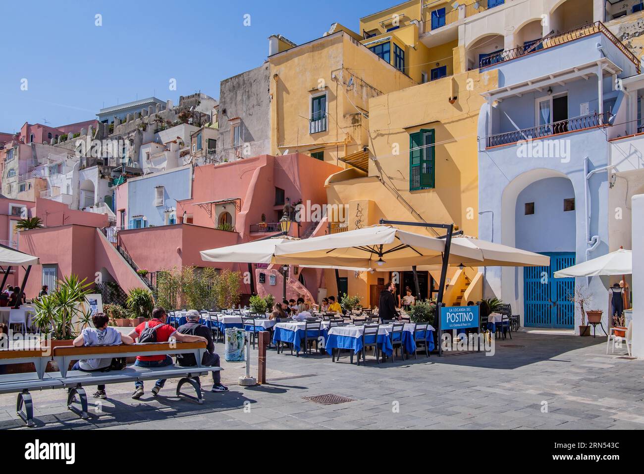 Fish restaurants on the waterfront of the fishing village of Corricella ...