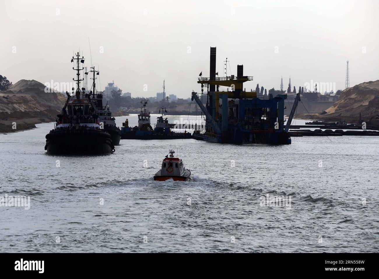 (150613) -- CAIRO, June 13, 2015 -- Dredgers work on the waterway of ...