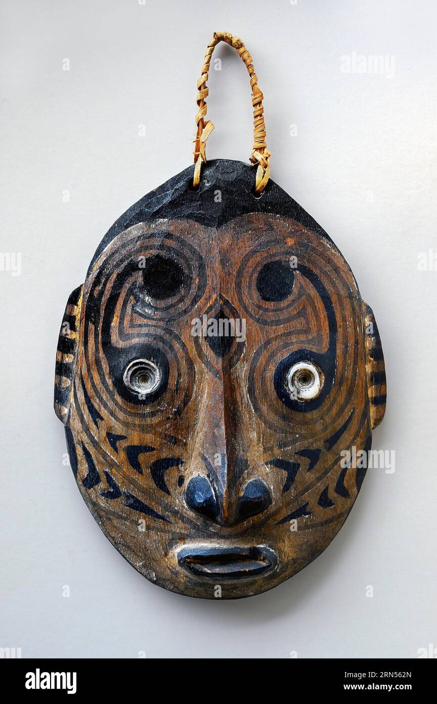 Mythological wooden mask, souvenir from Madang, Papua New Guinea ...