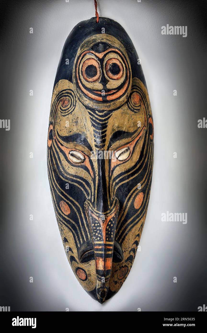 Mythological wooden mask, souvenir from Madang, Papua New Guinea ...